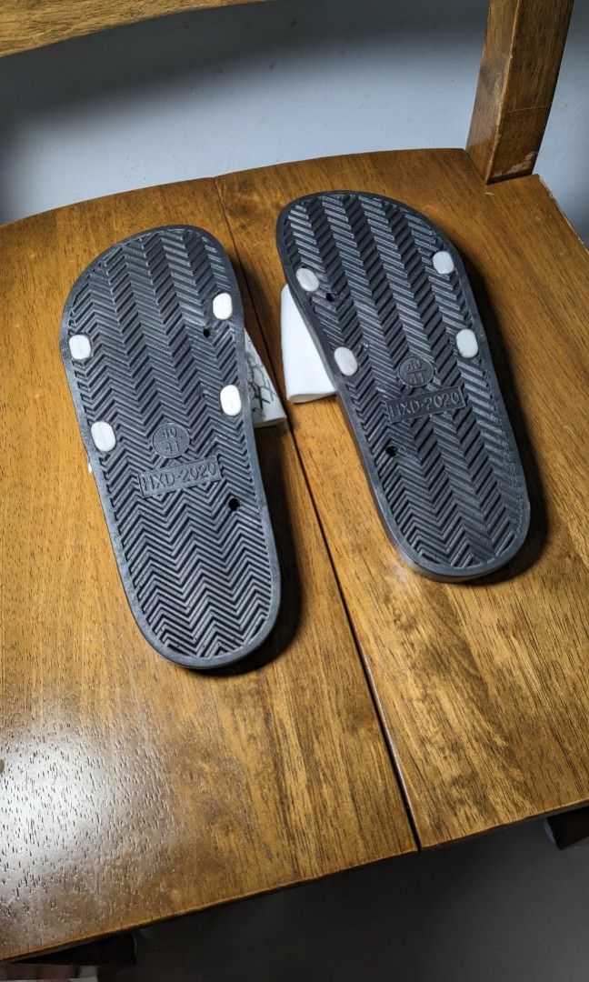 Kaws slides, Men's Fashion, Footwear, Flipflops and Slides on Carousell