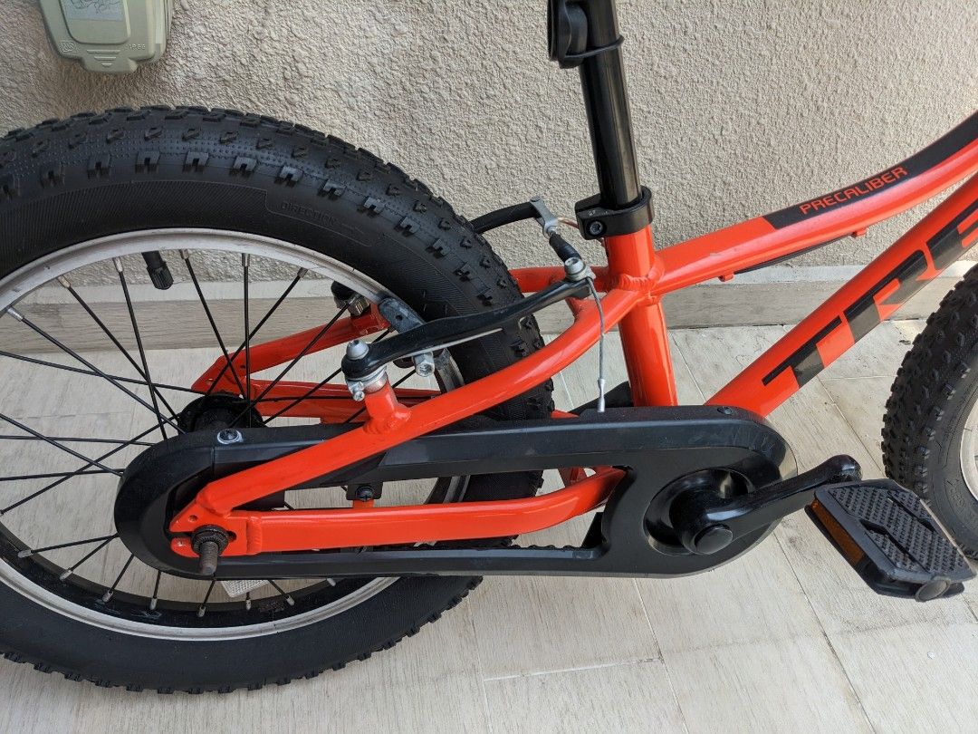 Trek 20 inch and 15inch calibre black and orange kids bike, Sports ...