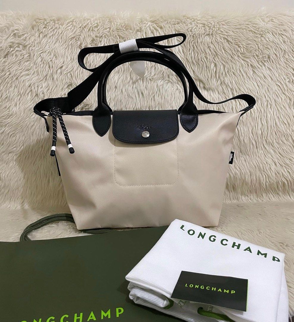 Longchamp energy small ivory, Luxury, Bags & Wallets on Carousell