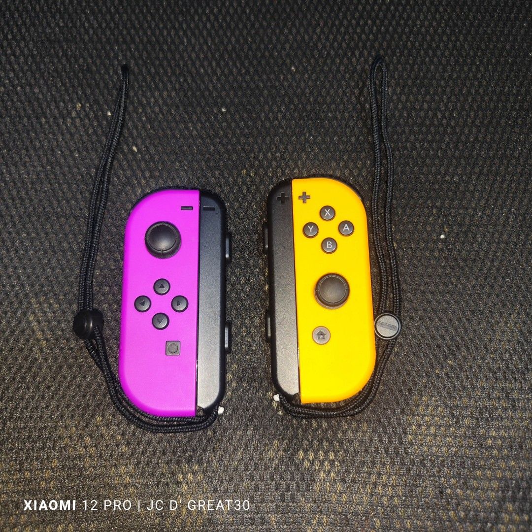 Nintendo Switch joycon neon purple and orange Original, Video Gaming ...