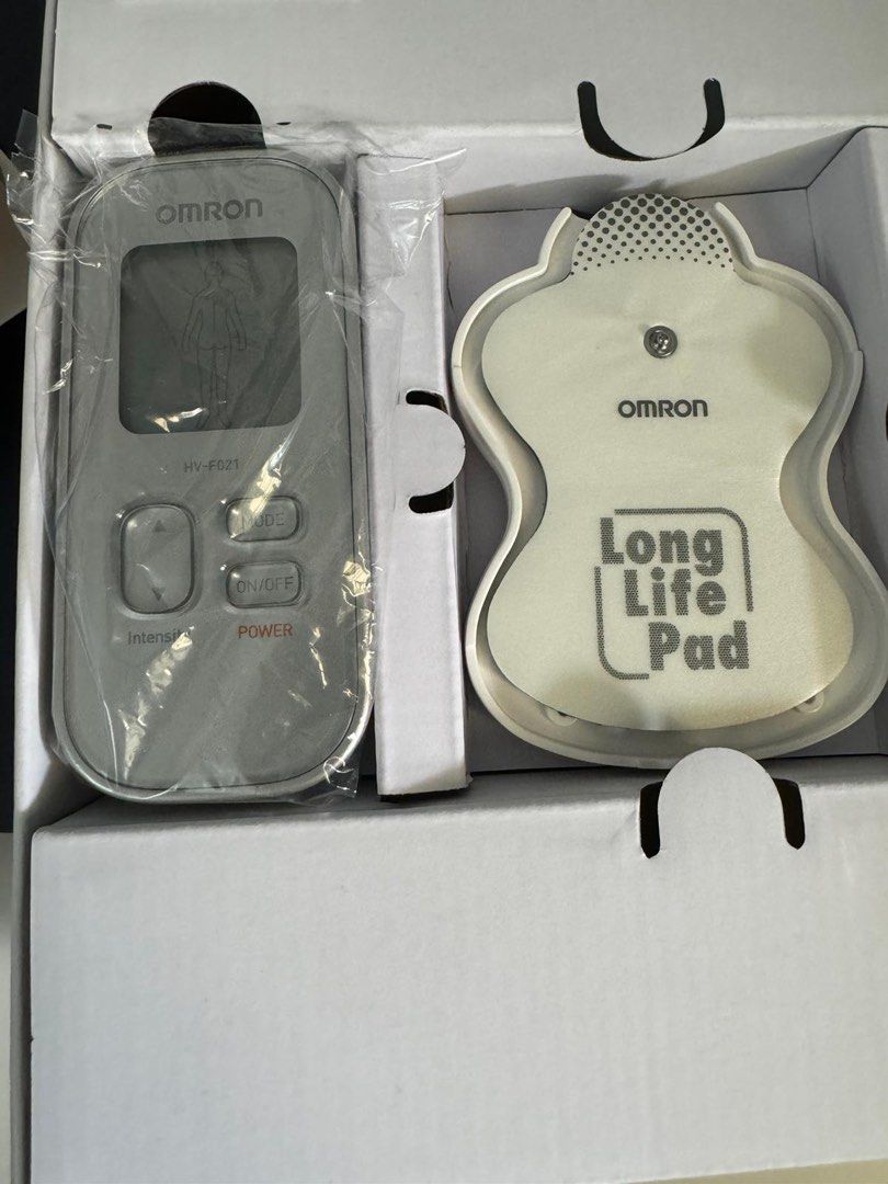 Omron HV-F021 electronic nerve simulator. Tens machine. transcutaneous ...