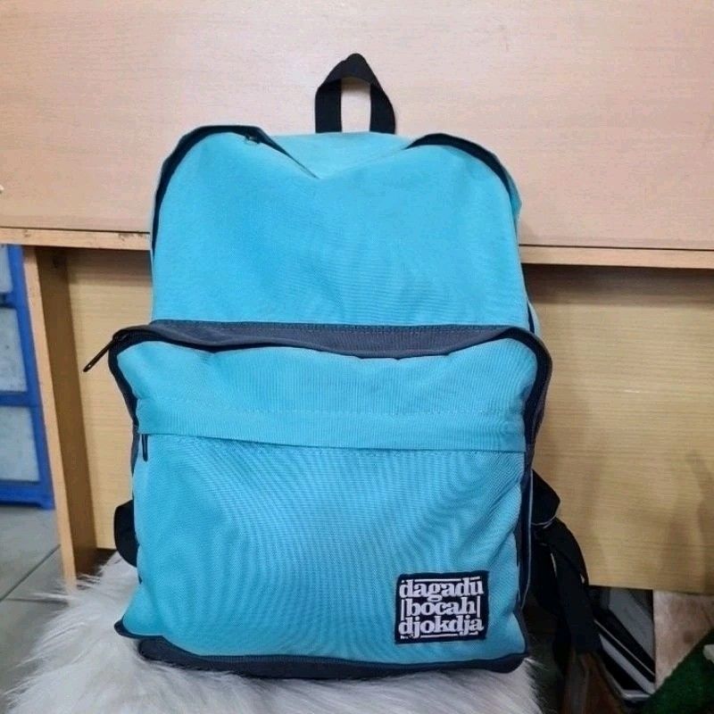 TAS RANSEL DAGADU ORIGINAL, Fesyen Pria, Tas & Dompet , Ransel di Carousell