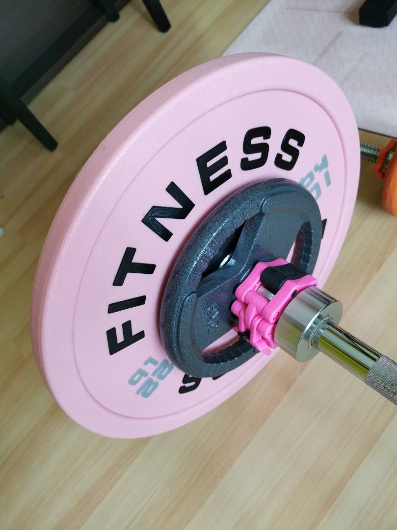 Home Gym Equipment - A Pink Weight Plates | Barbell | Dumbbells | An ...