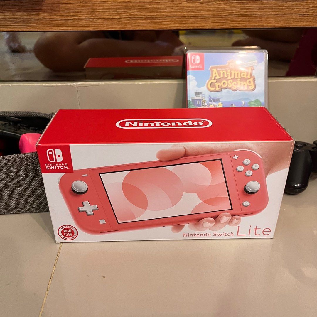 Nintendo Switch Lite Coral, Video Game, Konsol di Carousell