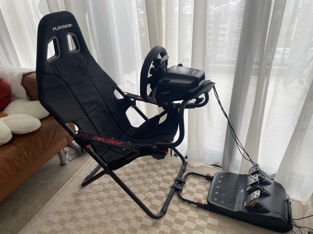 Logitech steering wheel and PLAYSEAT racing chair, Video Gaming, Gaming ...