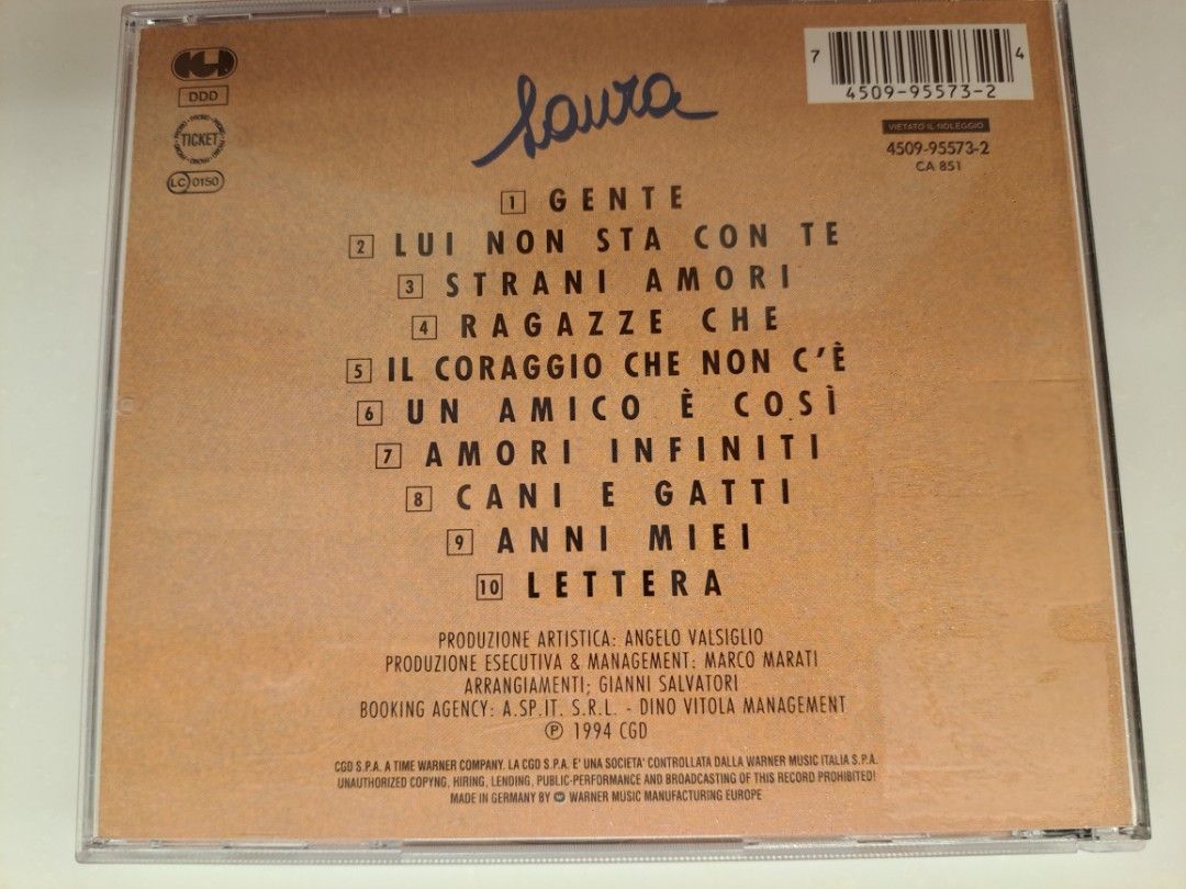 Laura Pausini - Laura. Italian vocal. 1994 CGD spa. A Time Warner ...