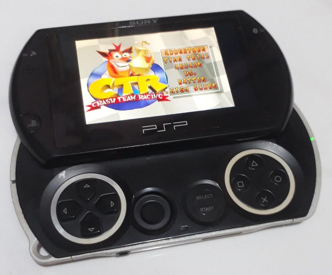 PSP go Sony 70 game mulus lancar siap main, Video Game, Konsol di Carousell