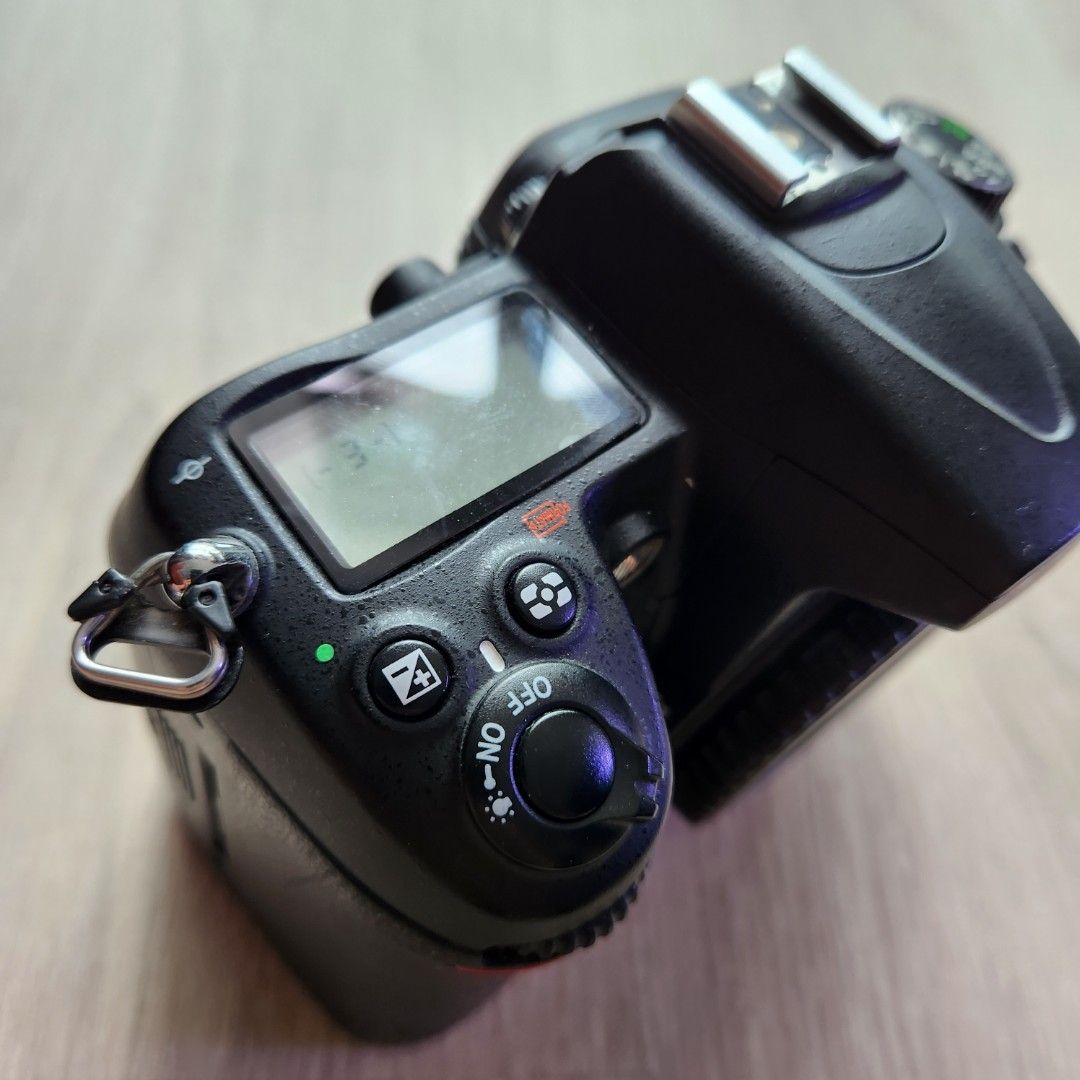Nikon D7000 with original battery grip, Photography, Cameras on Carousell
