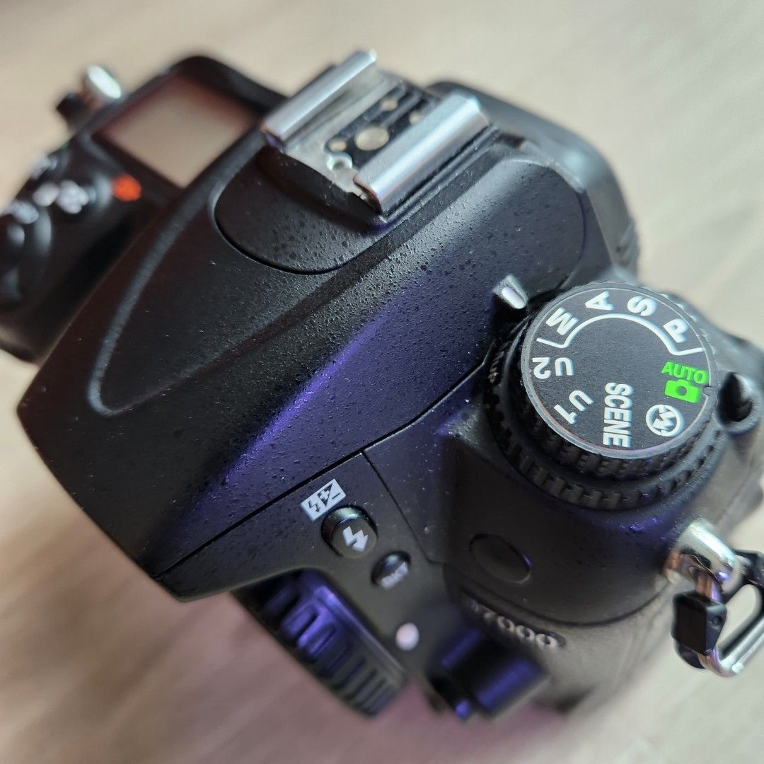 Nikon D7000 with original battery grip, Photography, Cameras on Carousell