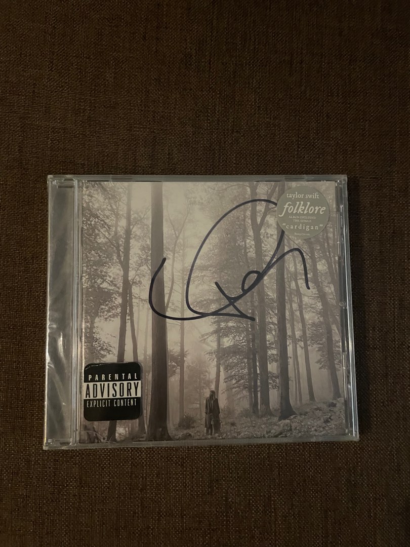 Taylor Swift Signed Folklore CD, Hobbies & Toys, Music & Media, CDs & DVDs on Carousell