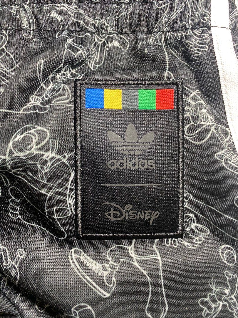 Adidas disney goofy track pants, Men's Fashion, Bottoms, Joggers on ...