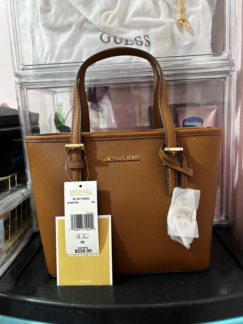 MK Carry All, Women's Fashion, Bags & Wallets, Cross-body Bags on Carousell