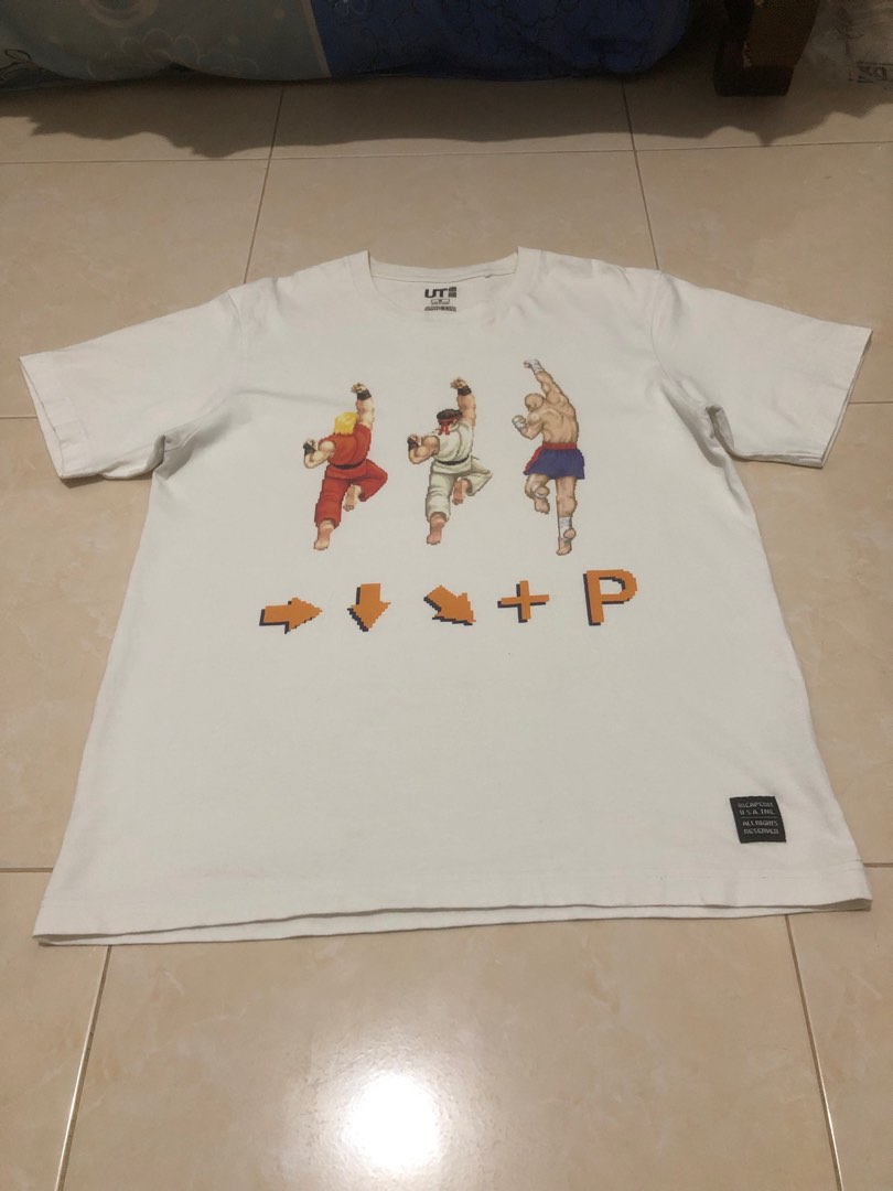 Uniqlo UT x Capcom Kaos putih uniqlo bergambar Game Street Fighter, Fesyen Pria, Pakaian ...