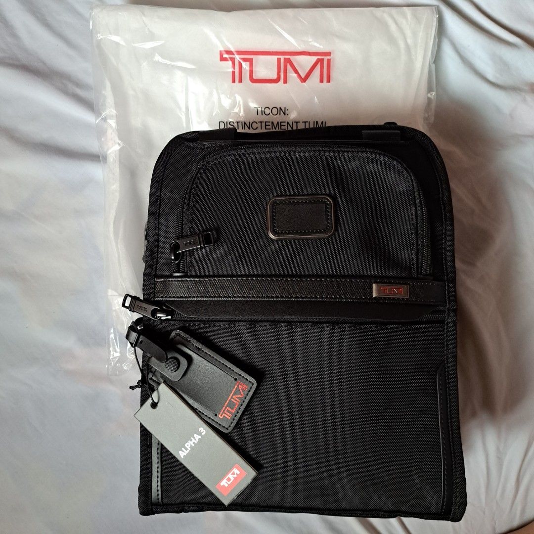 TUMI Alpha Expandable two-way travel tote, Men's Fashion, Bags, Sling Bags on Carousell