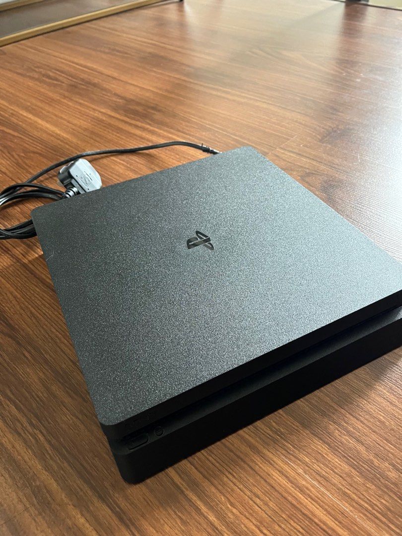 Ps4 1 TB with 2 consoles and charging port + games, Video Gaming, Video ...