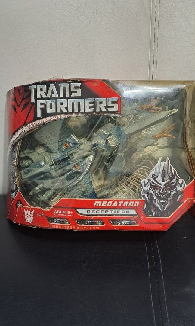Hasbro Transformers Optimus Prime and voyager class Decepticon Megatron ...