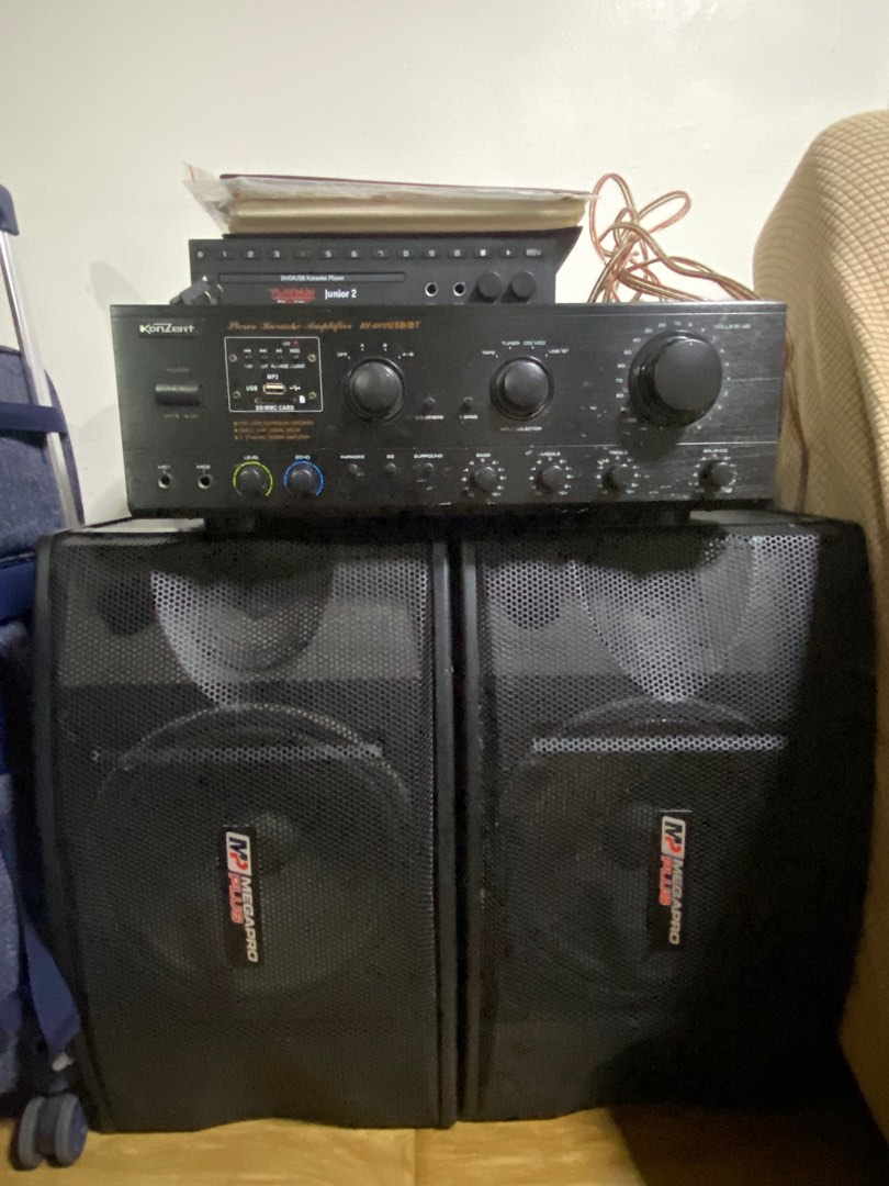 Karaoke set - speakers, amplifier, platinum karaoke player with song ...
