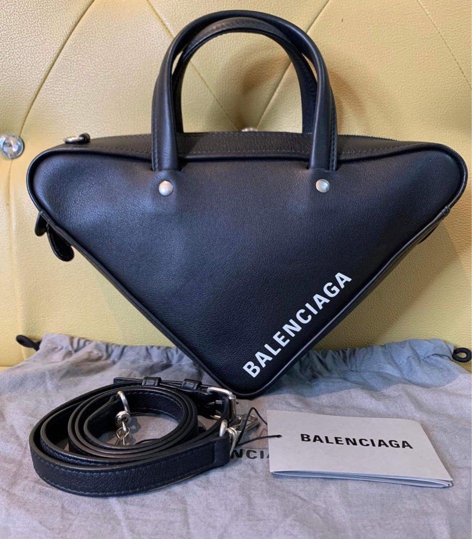 Balen triangle, Luxury, Bags & Wallets on Carousell