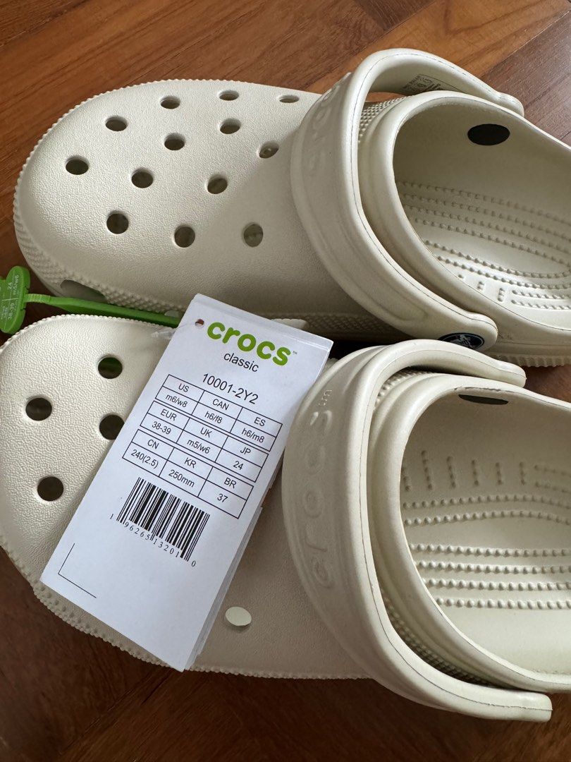 Crocs bone colour, Men's Fashion, Footwear, Flipflops and Slides on ...