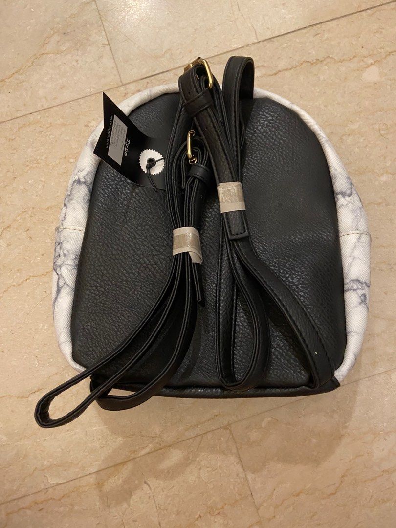 Typo Marble Bag Backpack Black White, Women's Fashion, Bags & Wallets, Backpacks on Carousell