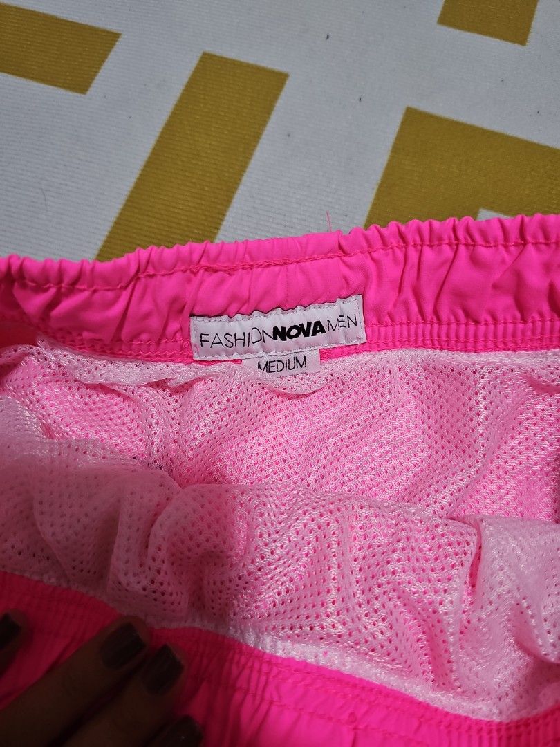 Neon pink swim trunk, Men's Fashion, Bottoms, Shorts on Carousell