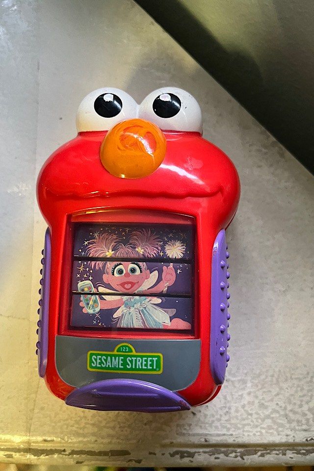 Playskool sesame street elmo slide phone with sounds and three friends ...