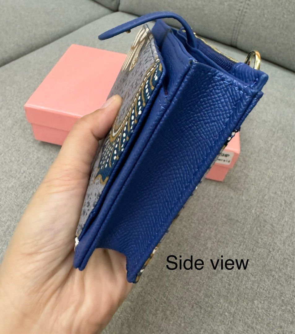 CFOB Calf Wristlet, Women's Fashion, Bags & Wallets, Clutches on Carousell