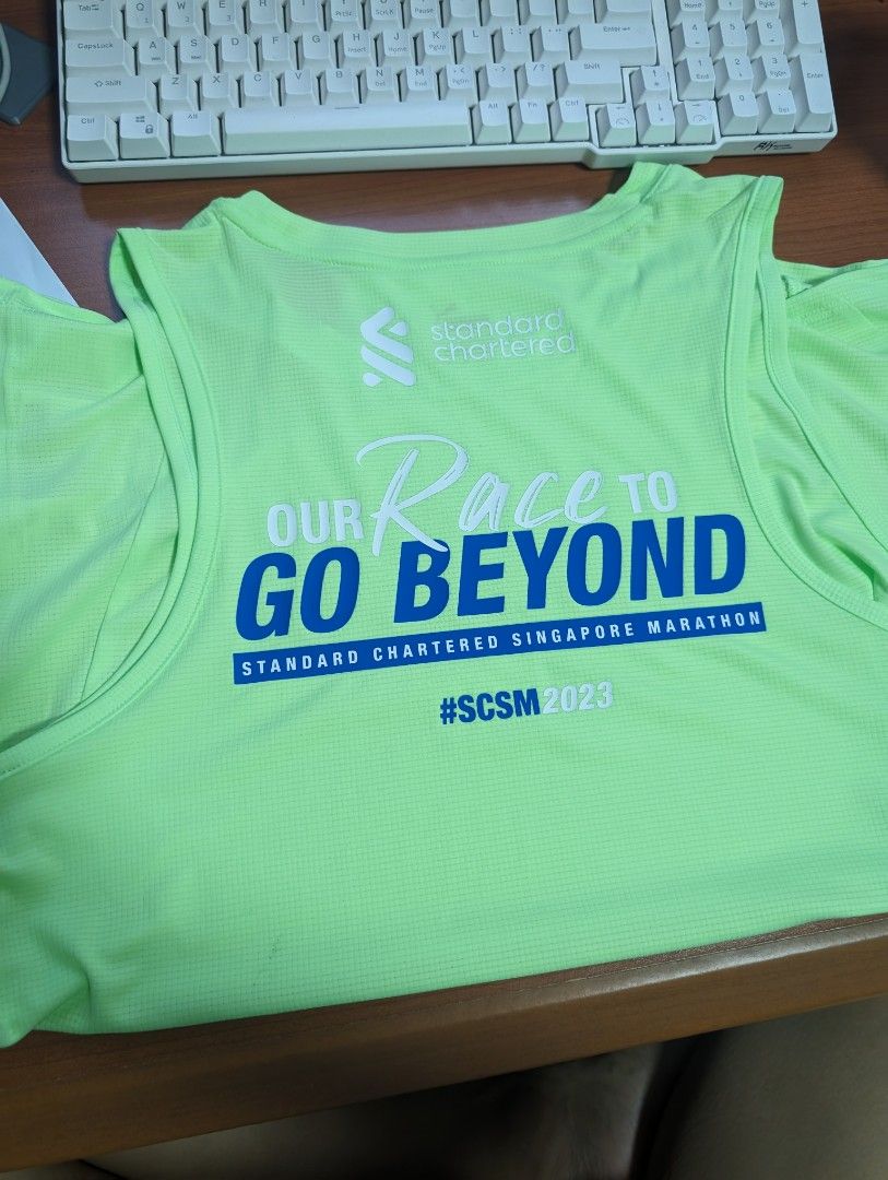 standard chartered 2023 shirt, Men's Fashion, Activewear on Carousell