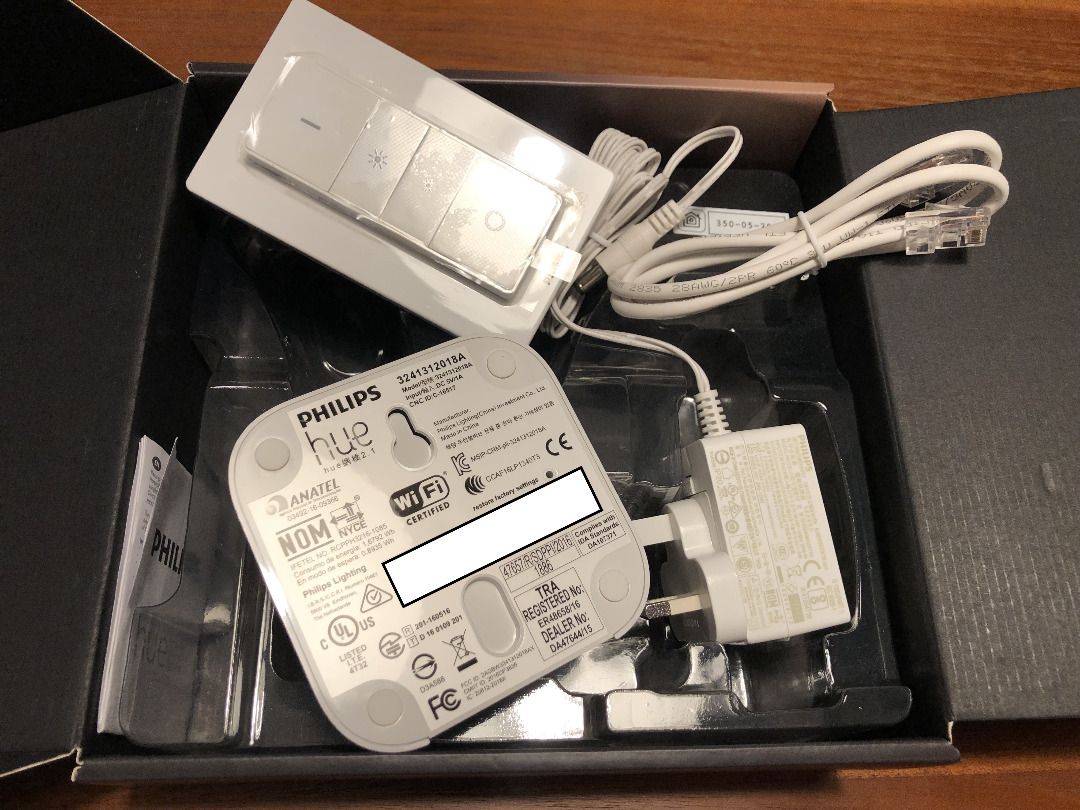 Philips Hue Smart Bridge, with light switch and Ethernet cable. Model ...