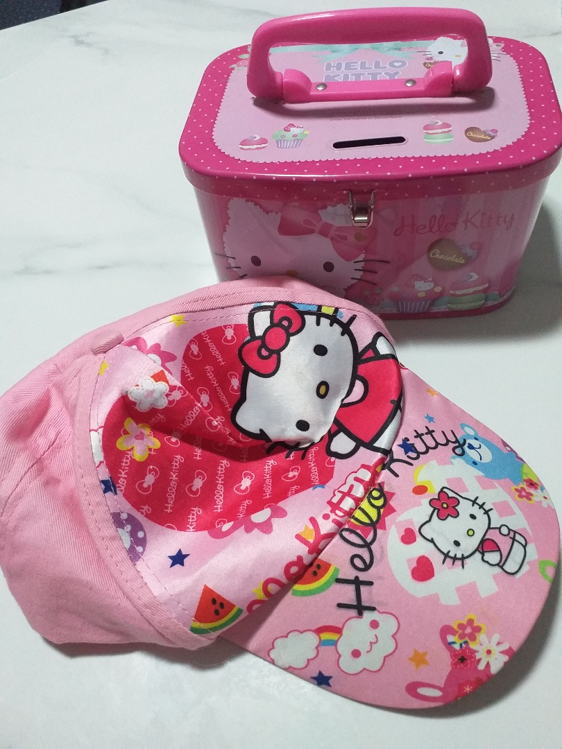Hello Kitty coin bank and hat, Hobbies & Toys, Toys & Games on Carousell