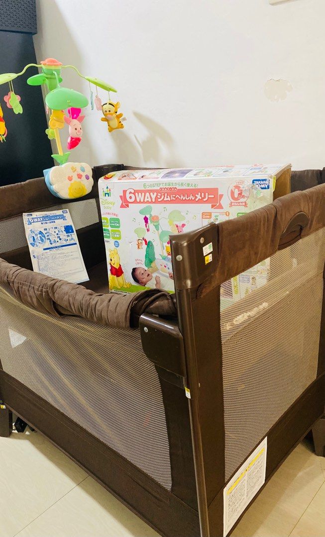 Aprica Coconel Air Plus with free crib toy, Babies & Kids, Baby Nursery ...