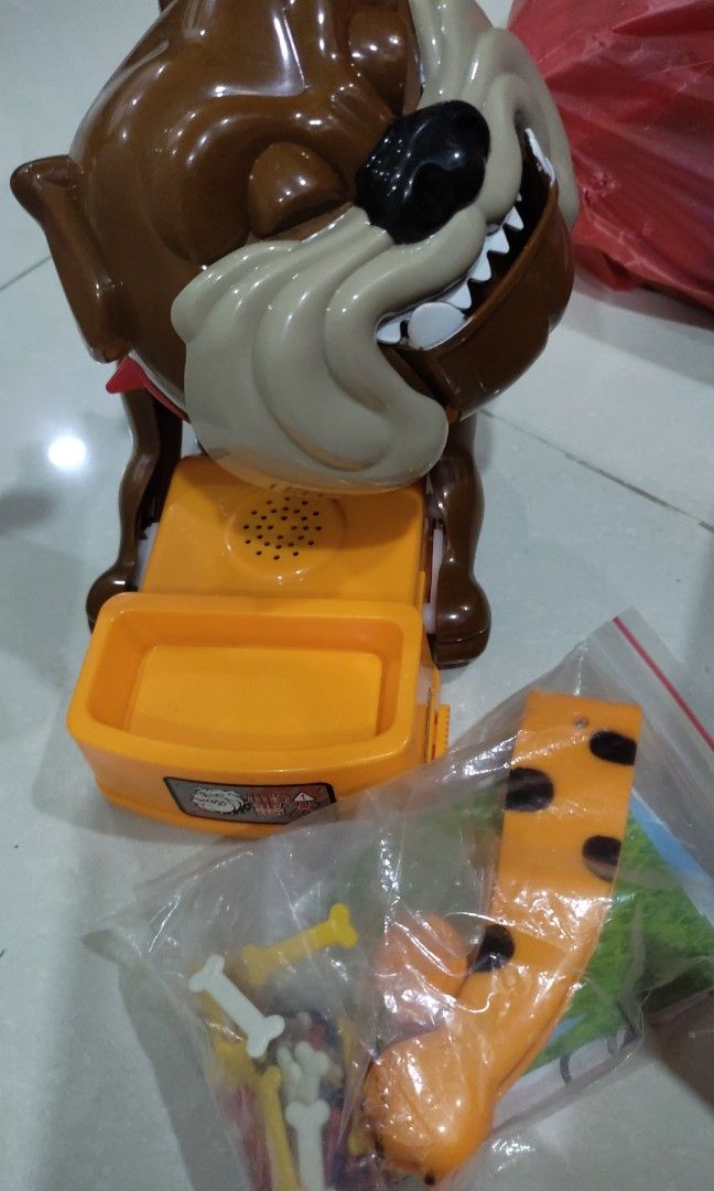 Dog bite game, Hobbies & Toys, Toys & Games on Carousell