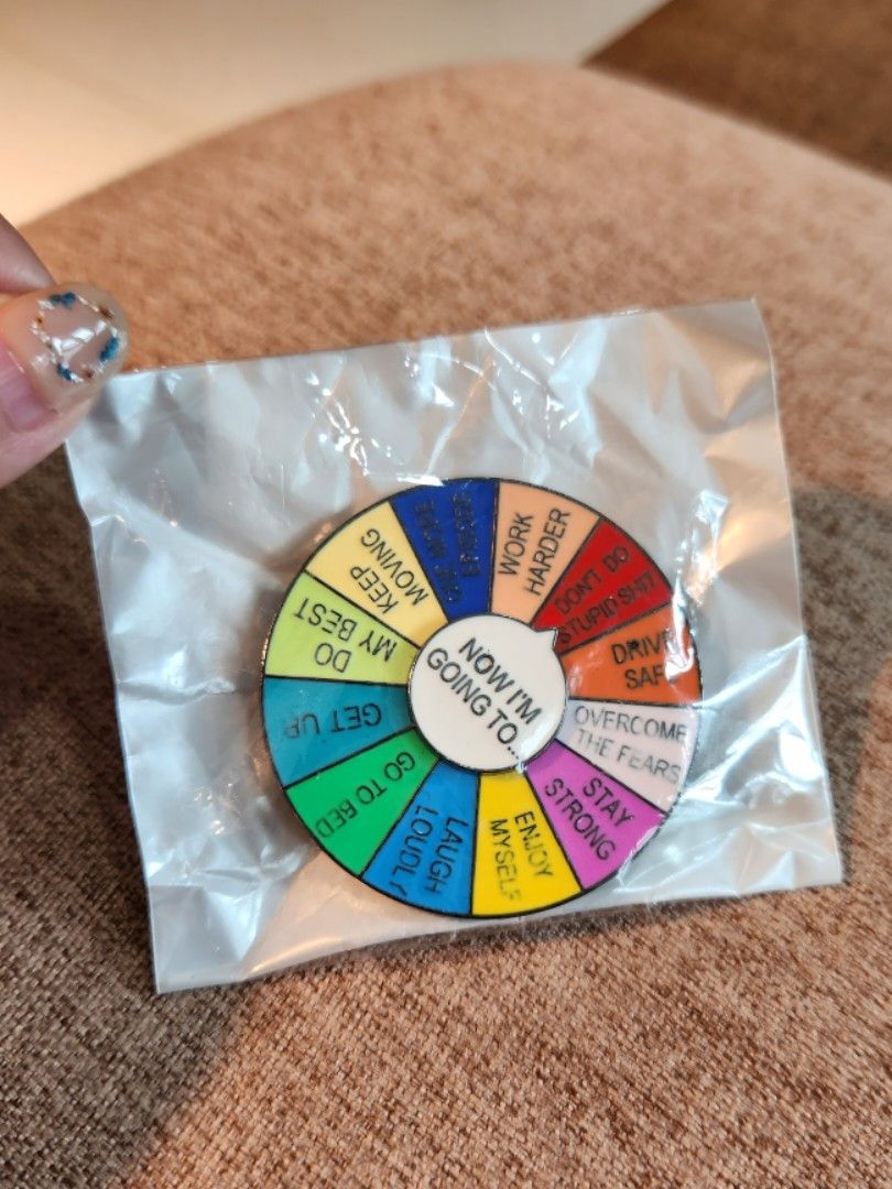 Spinning wheel enamel pin, Everything Else on Carousell