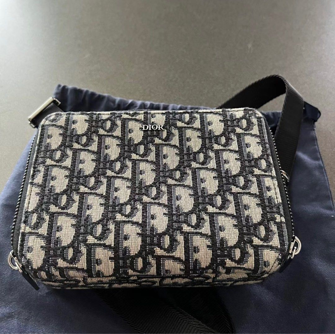 Dior Essential pouch bag, Luxury, Bags & Wallets on Carousell