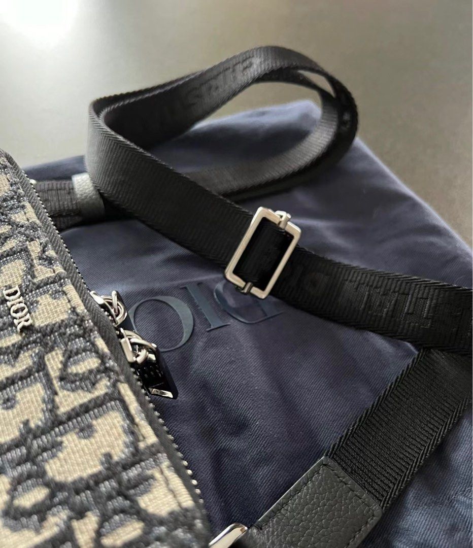 Dior Essential pouch bag, Luxury, Bags & Wallets on Carousell