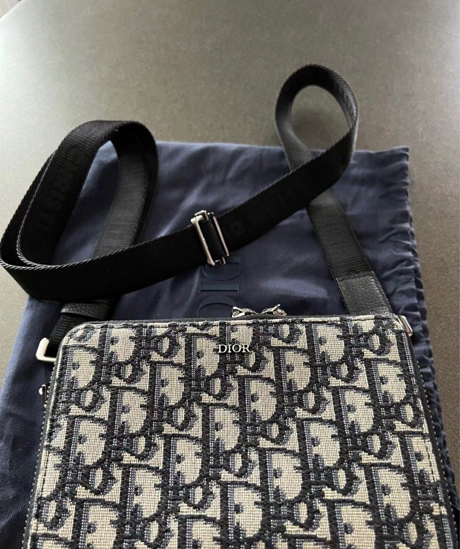 Dior Essential pouch bag, Luxury, Bags & Wallets on Carousell