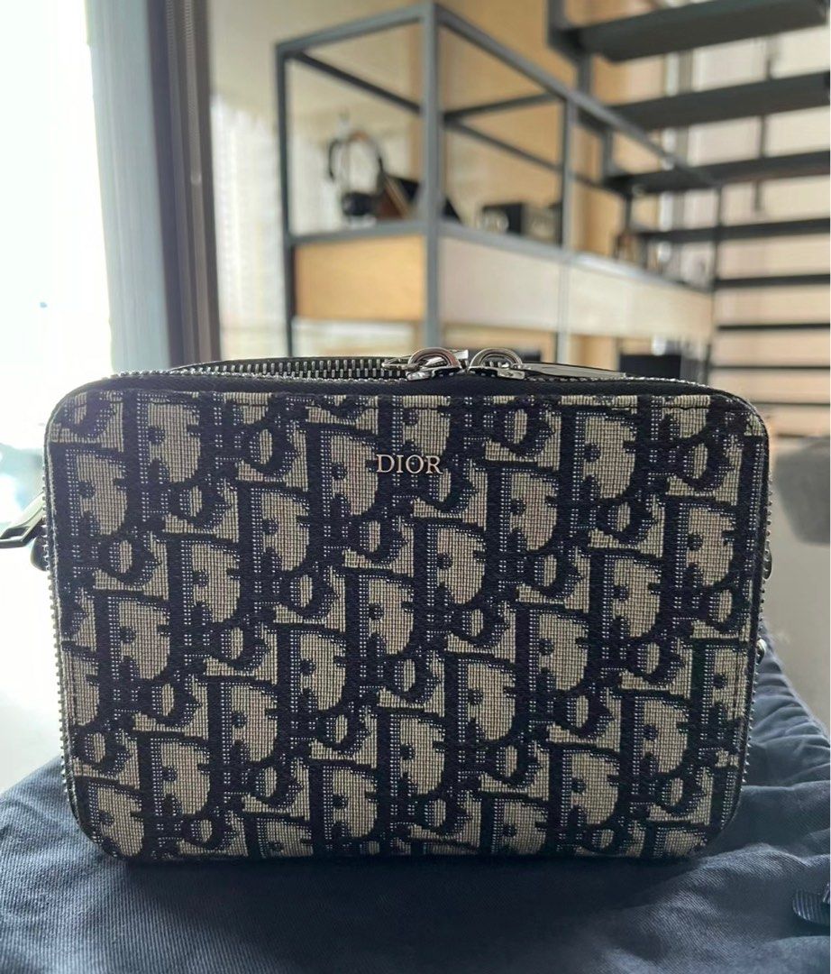 Dior Essential pouch bag, Luxury, Bags & Wallets on Carousell