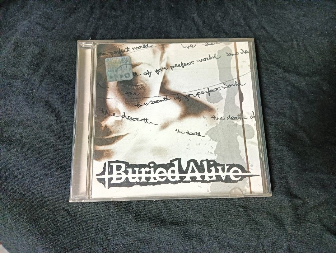 Buried Alive - The death of your perfect world, Hobbies & Toys, Music ...