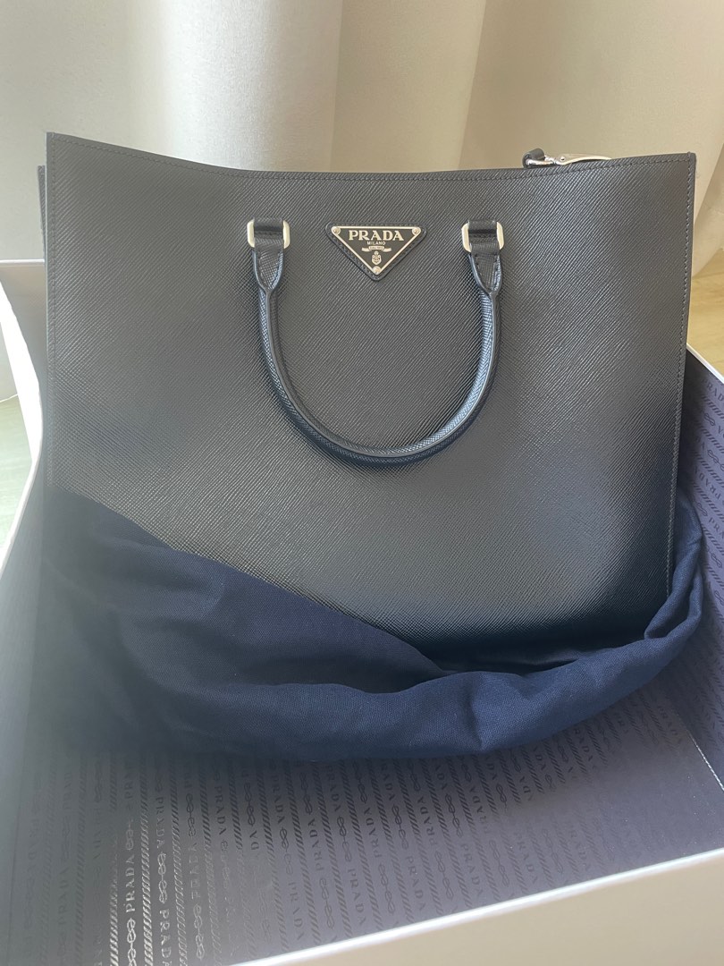 Prada Saffiano Cuir leather laptop bag, Luxury, Bags & Wallets on Carousell