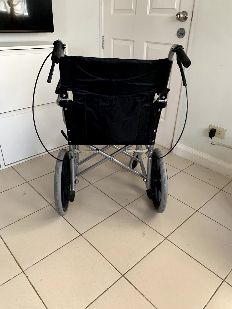 Wheelchair - FeatherLite Fold & Roll: Your Ticket to Effortless ...