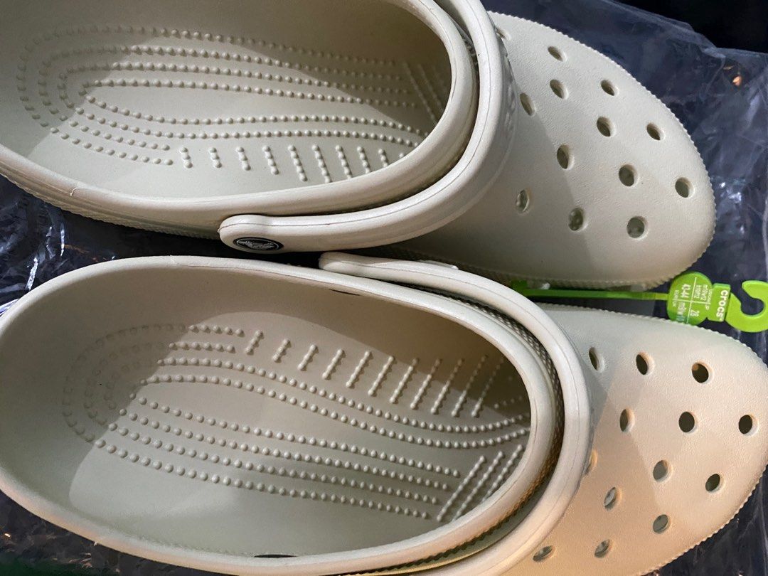 Crocs Classic Bone Clogs, Men's Fashion, Footwear, Slippers & Slides on ...