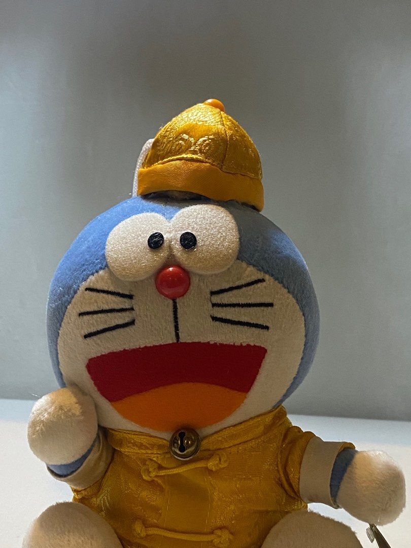 Doraemon gold chinese costume plush toy, Hobbies & Toys, Toys & Games ...