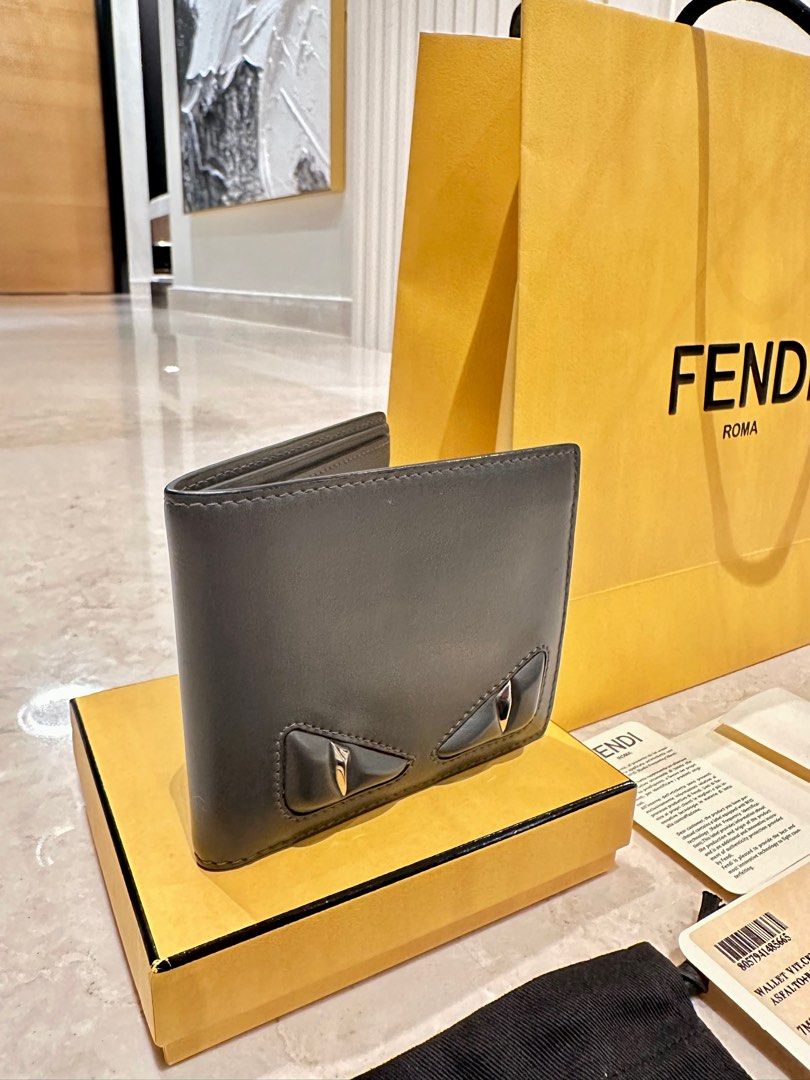 Authentic Fendi Monster Eye men wallet, Luxury, Bags & Wallets on Carousell