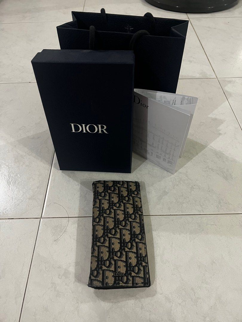 Dior vertical long wallet, Luxury, Bags & Wallets on Carousell
