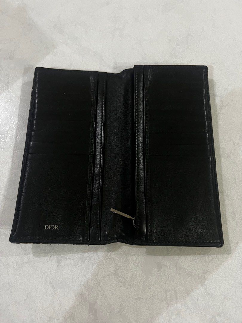 Dior vertical long wallet, Luxury, Bags & Wallets on Carousell
