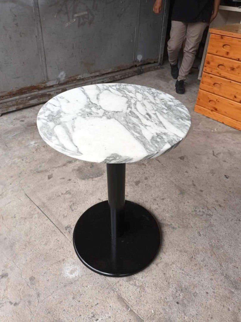 Round marble top outdoor table 19 1/2D x 28H inches In good condition ...