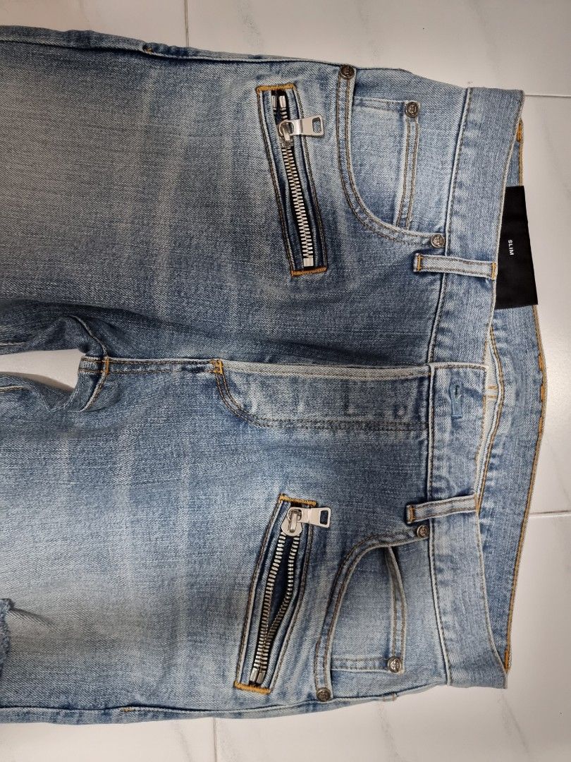 Balmain Ripped Jeans (31), Luxury, Apparel on Carousell