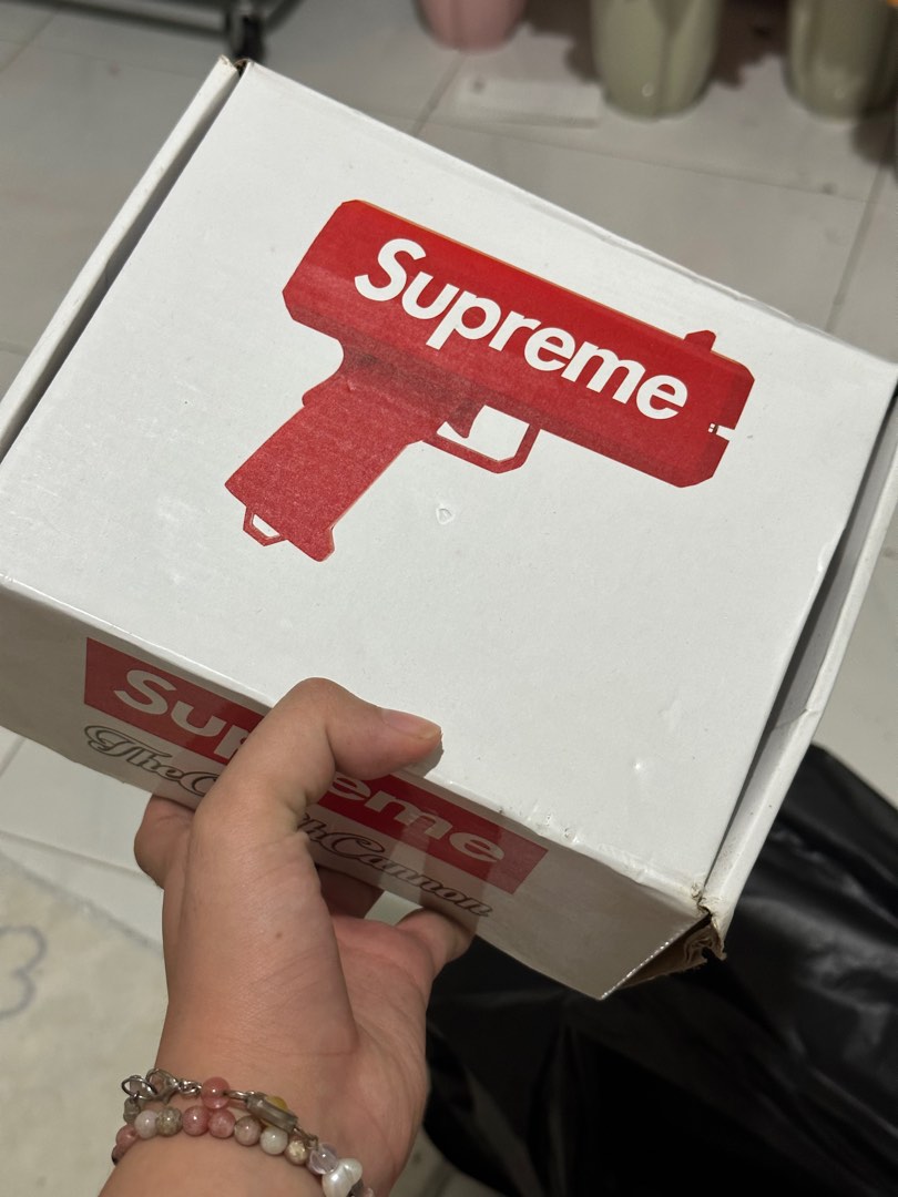 SUPREME MONEY GUN TOY, Hobbies & Toys, Toys & Games on Carousell