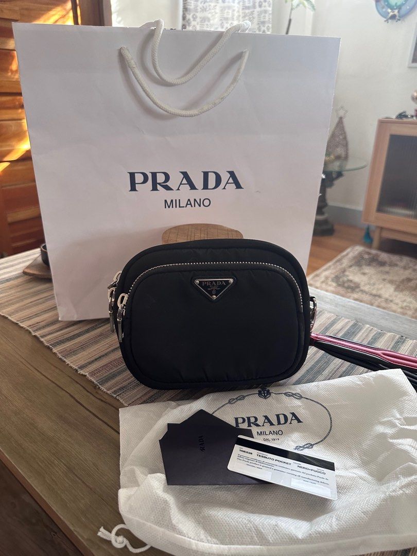 Authentic Prada wristlet, Luxury, Bags & Wallets on Carousell