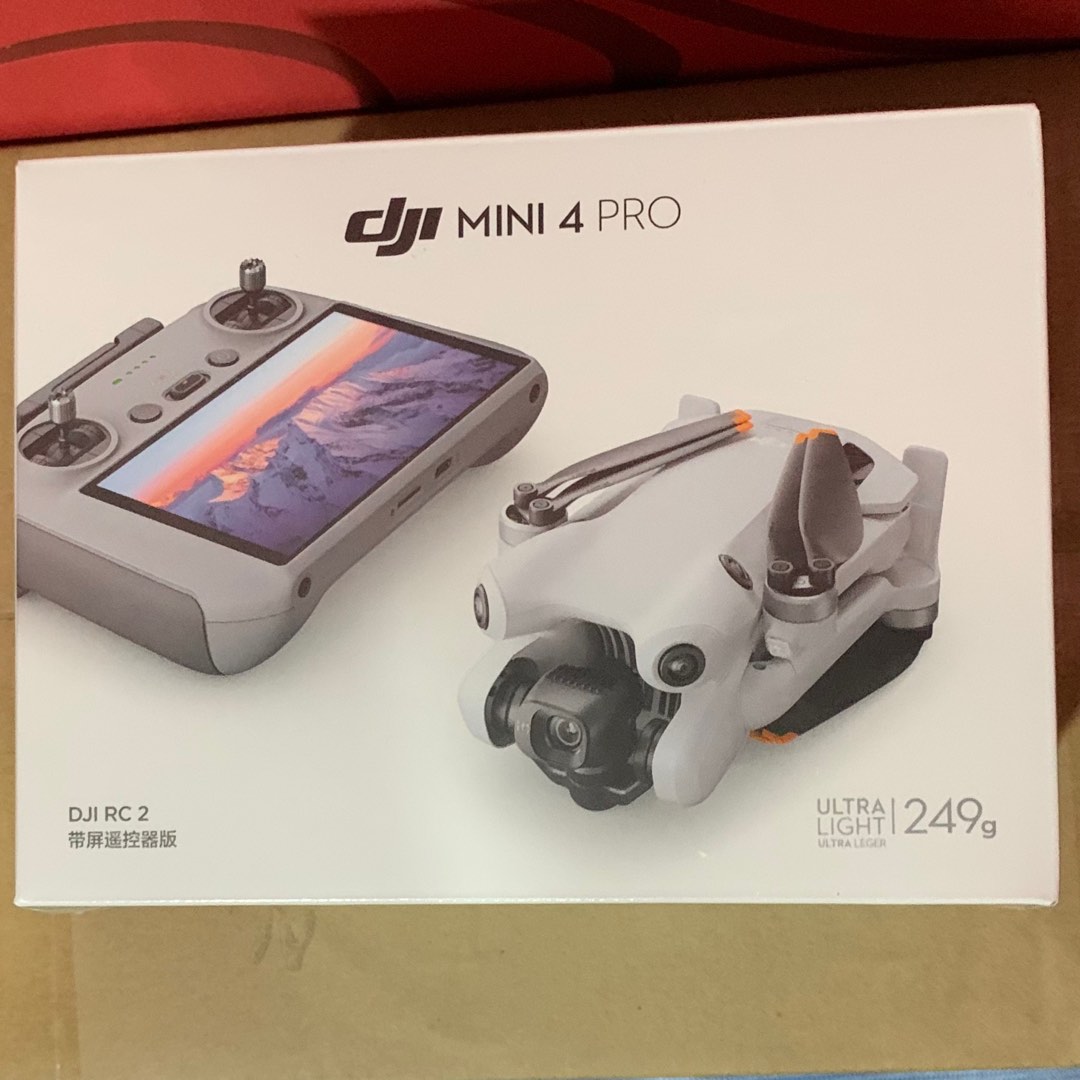DJI Mini 4 Pro with RC2 controller, Photography, Drones on Carousell